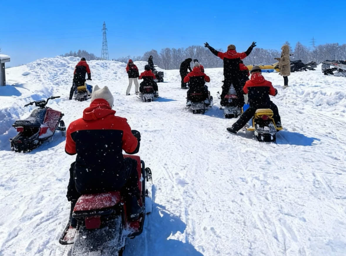 Hokkaido Snowmobiling Experience with Hot Drink & Photo Souvenir ...