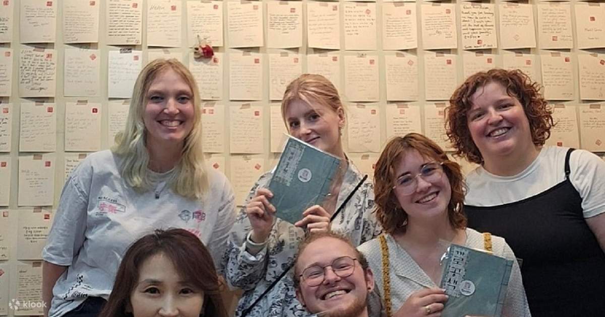 Making a traditional notebook & naming on it in Hangeul in Seoul ...