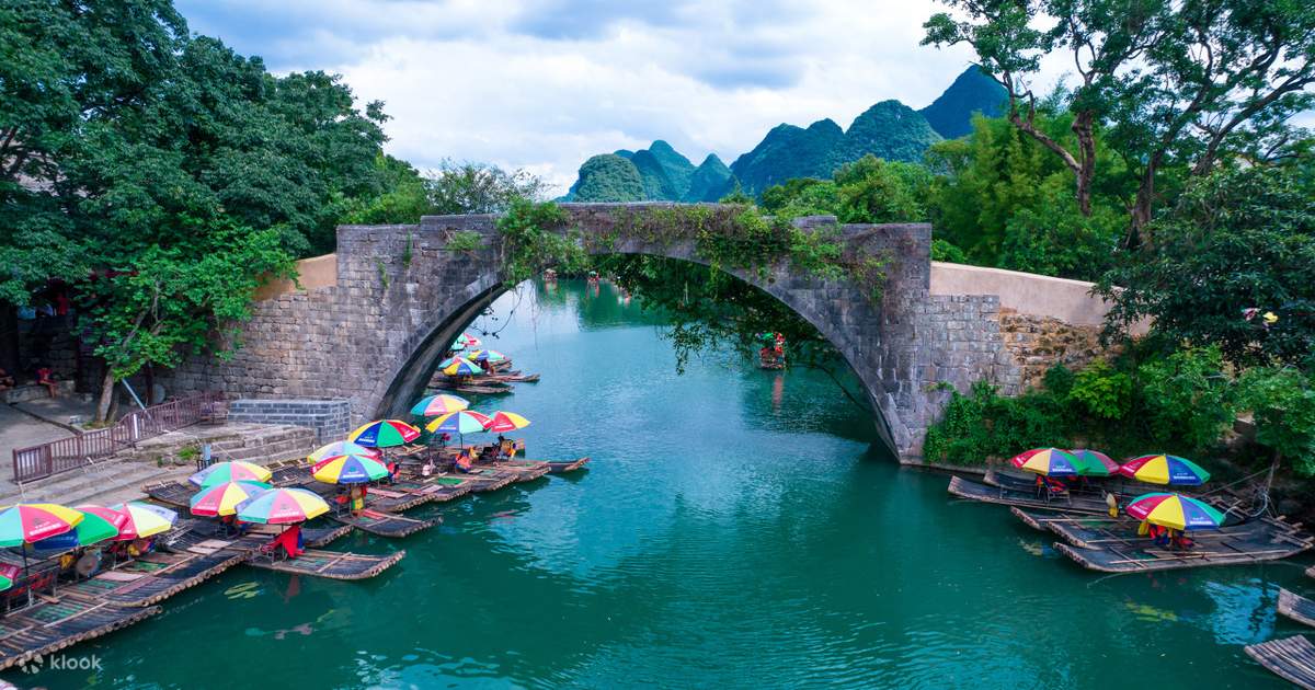 Yulong River Bamboo Rafting & Xianggong Mountain & Utopia One-Day Tour ...