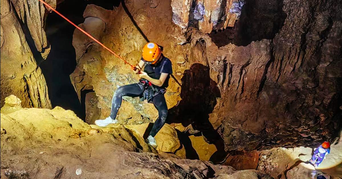 Guilin Yangshuo Devil Cave Caving, Rappelling, and Rock Climbing Day ...