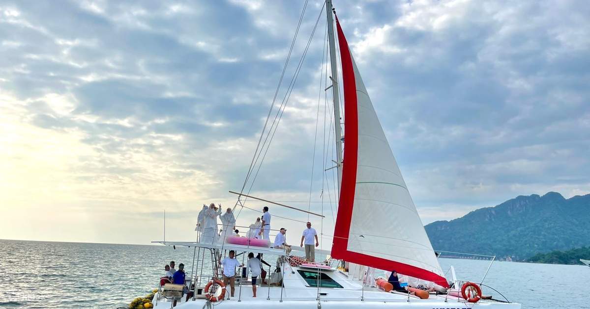 Experience the Magic: Standard Sunset Cruise with Dinner by Kapal Layar ...