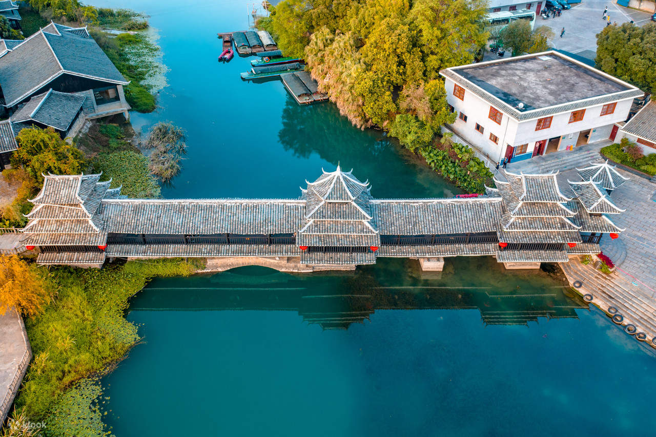 Yulong River Bamboo Rafting & Xianggong Mountain & Utopia One-Day Tour ...