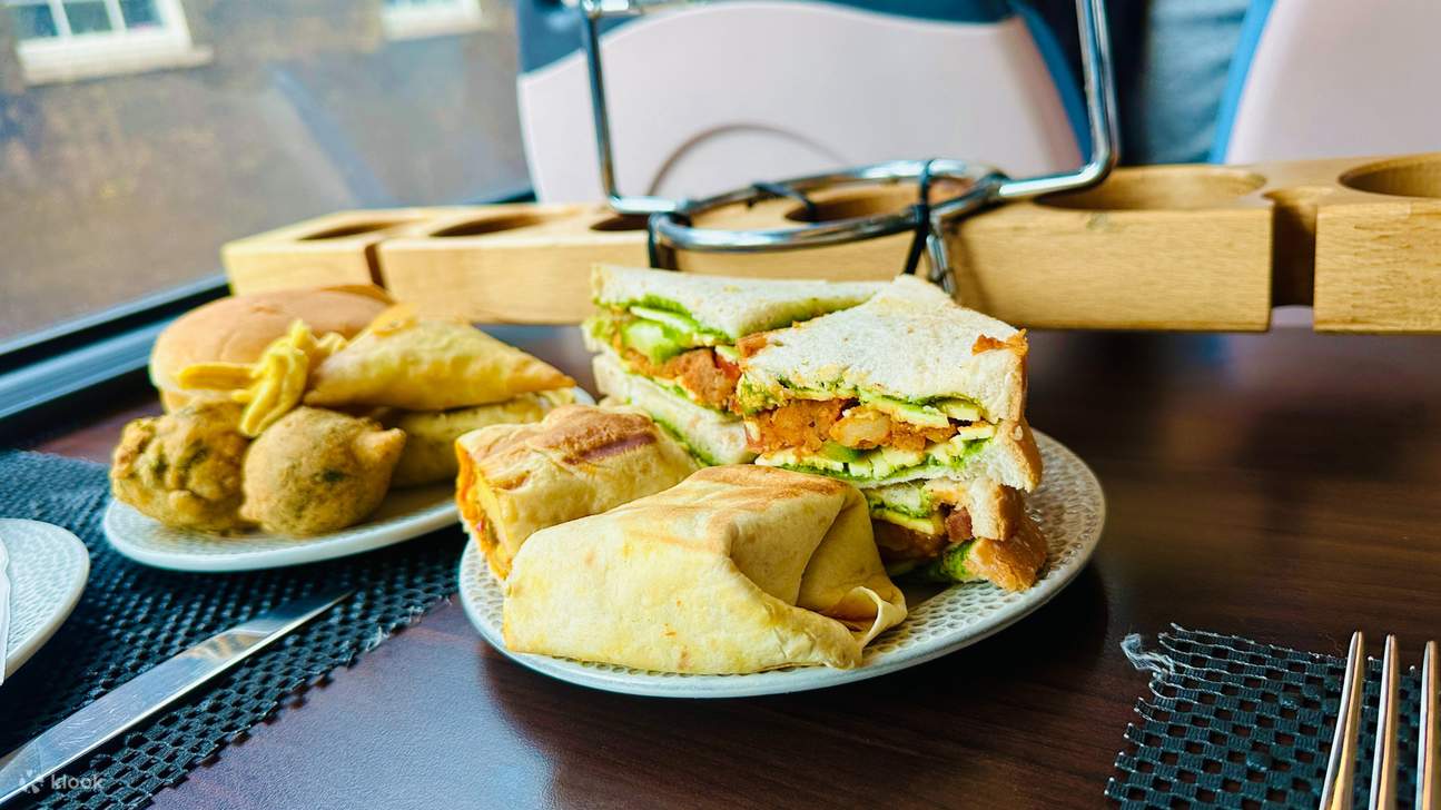 Bollywood-themed dinner experience on a bus with a live singer - Klook ...