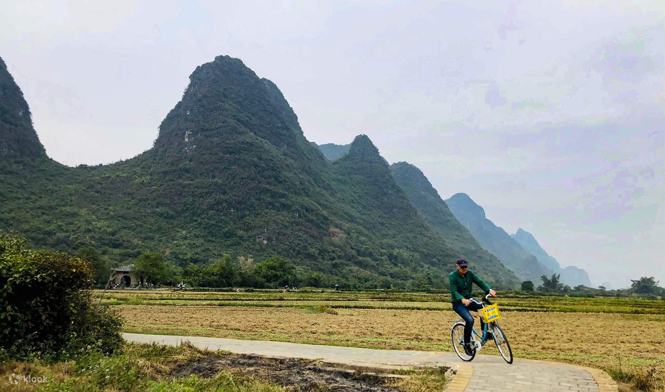 Yangshuo Outdoor Yulong River Cycling and Rock Climbing Day Tour ...