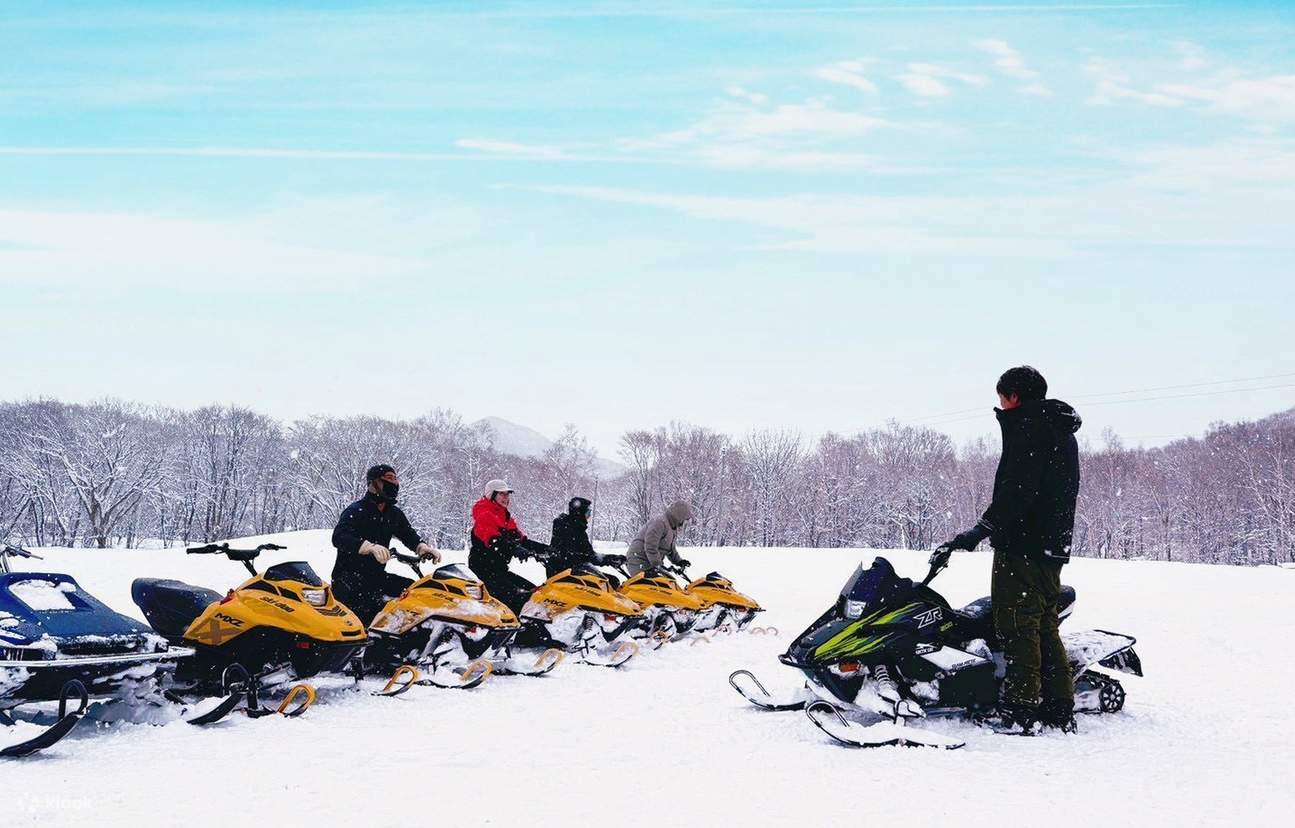 Hokkaido Snowmobiling Experience with Hot Drink & Photo Souvenir ...