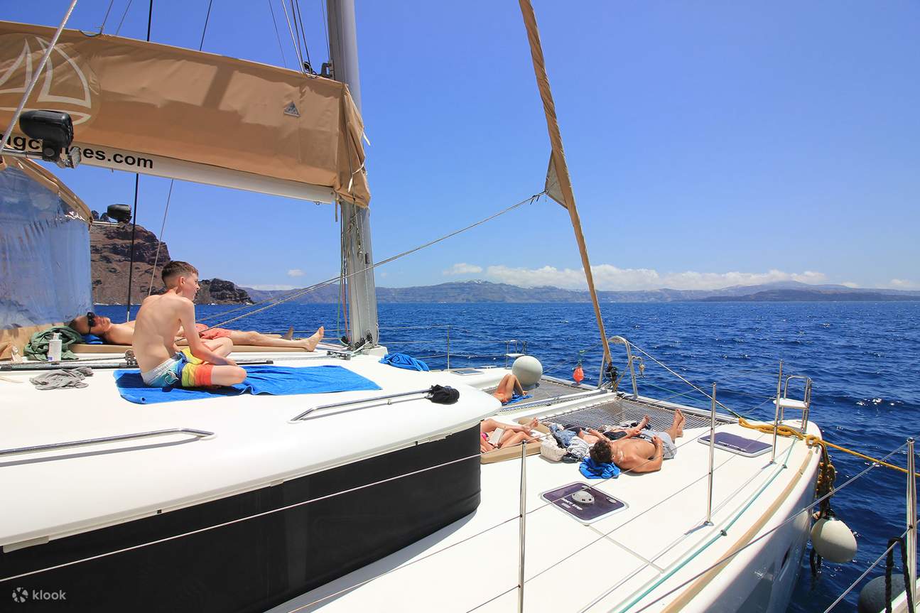 Santorini Catamaran Cruise: Swim Stops, Lunch, Drinks, & Transfers ...
