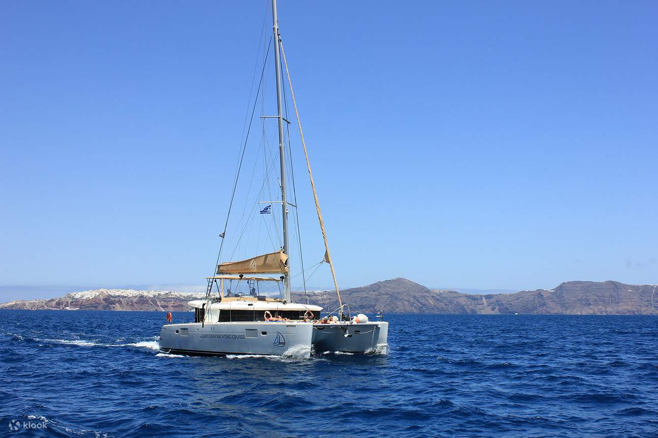 Santorini Catamaran Cruise: Swim Stops, Lunch, Drinks, & Transfers ...