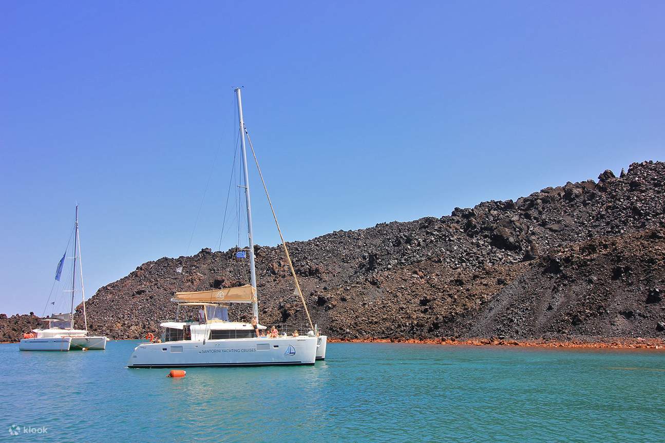 Santorini Catamaran Cruise: Swim Stops, Lunch, Drinks, & Transfers ...